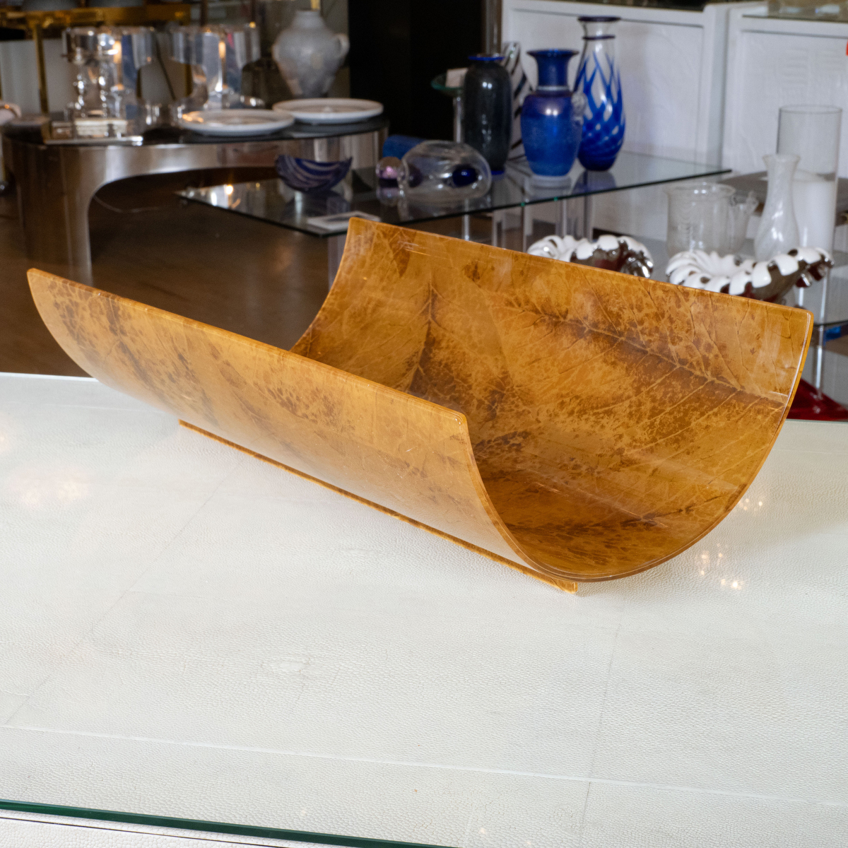 Curved coconut resin magazine rack | Magazine Racks | John Salibello