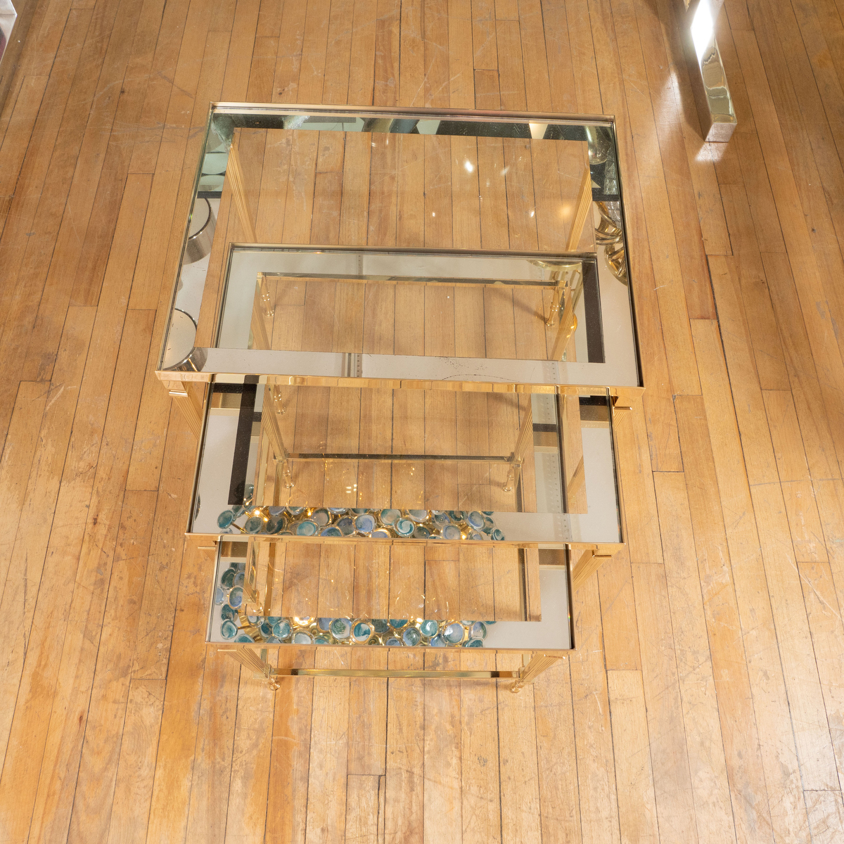 Trio of brass and glass nesting tables | Side & End Tables | John Salibello